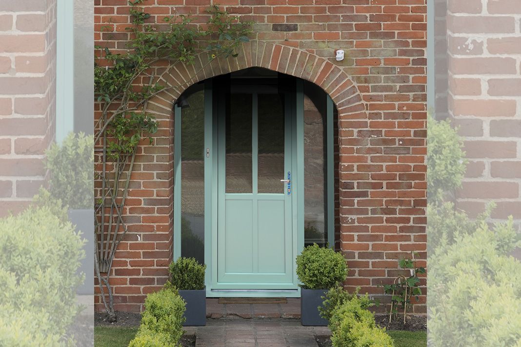 Residence ‘embracing’ hand-crafted entrance doors | Glass & Glazing ...