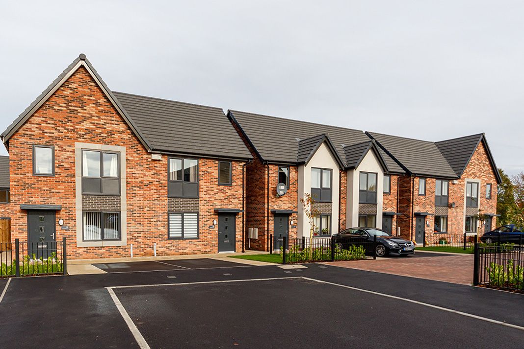 Gold-standard development fitted with Spectus windows | Glass & Glazing ...