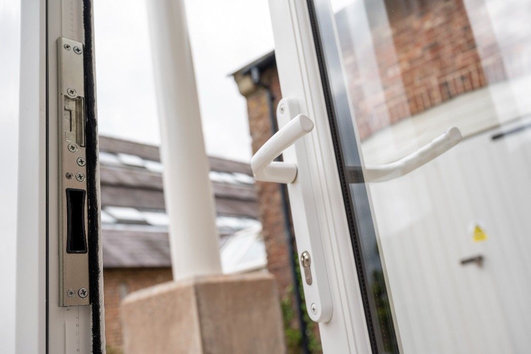 Rehau introduces open-out Rio door | Glass & Glazing Products Magazine ...